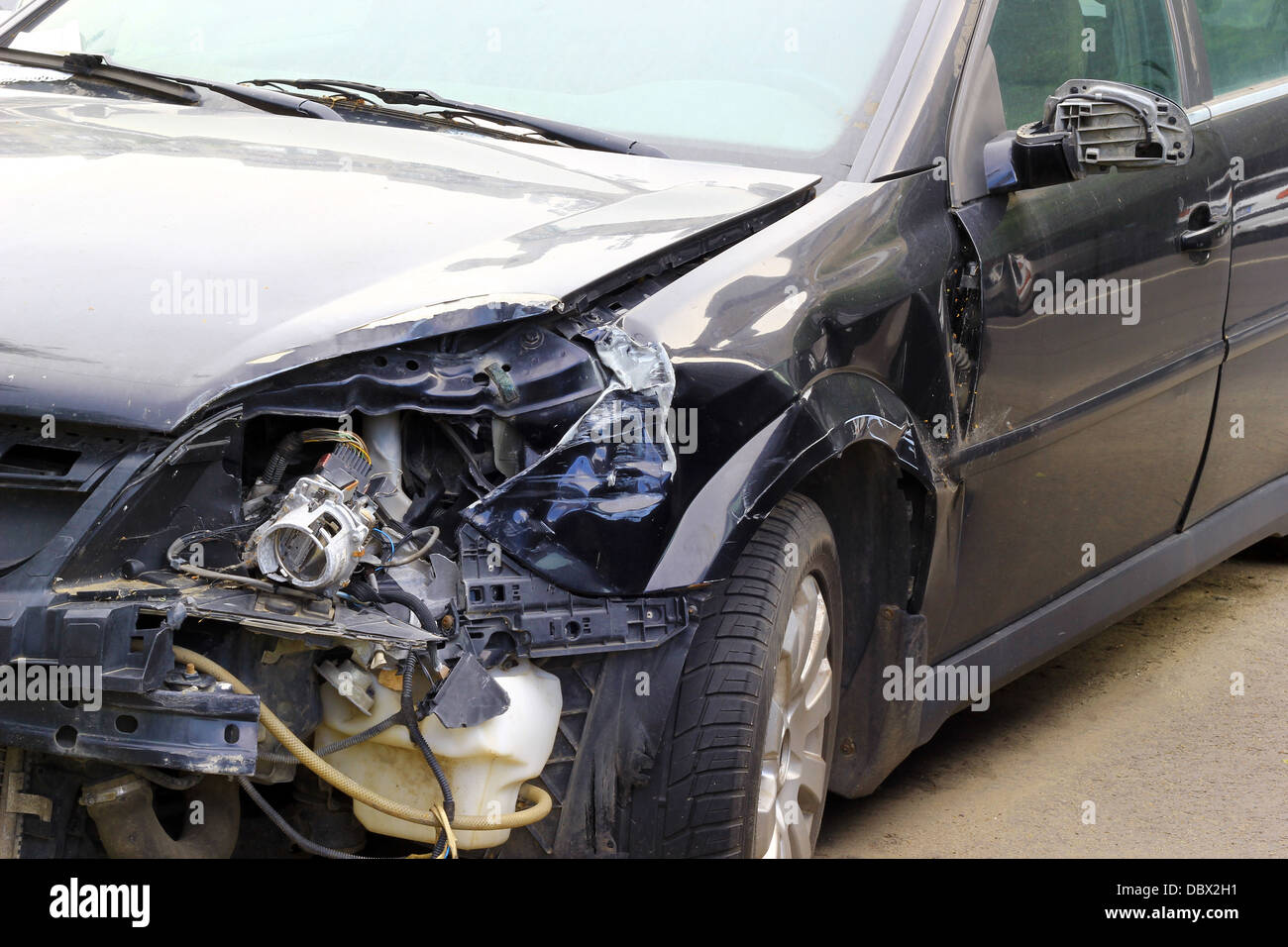 Crashed car close up. The front part is severely damaged Stock Photo ...