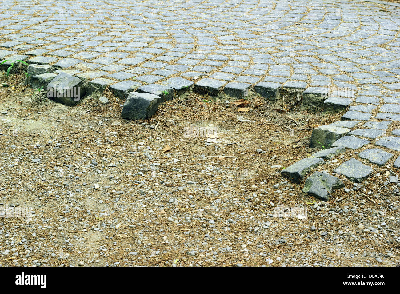 Rocks missing from pavement Stock Photo - Alamy