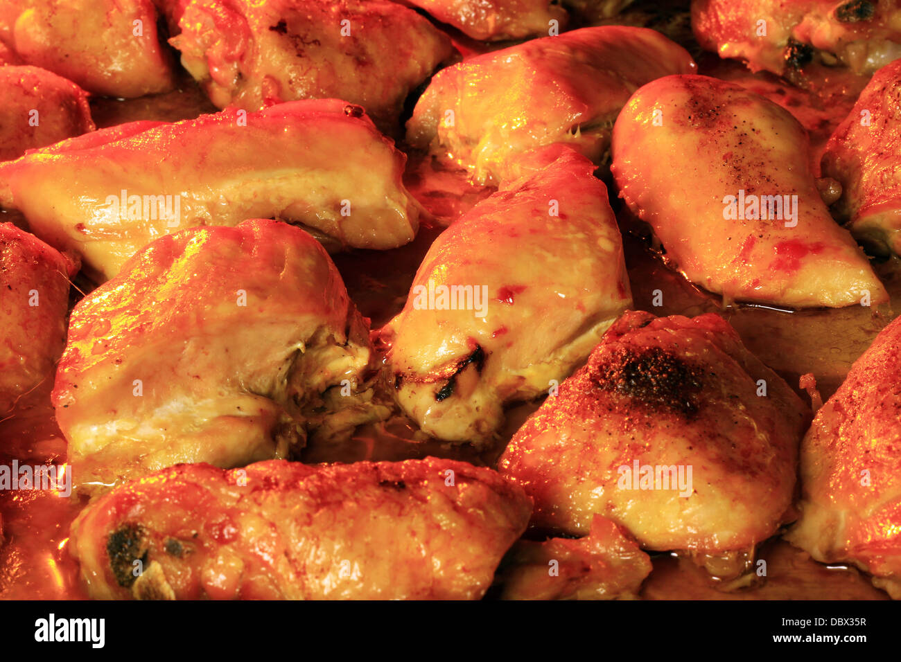Chicken thighs with skin hi-res stock photography and images - Alamy
