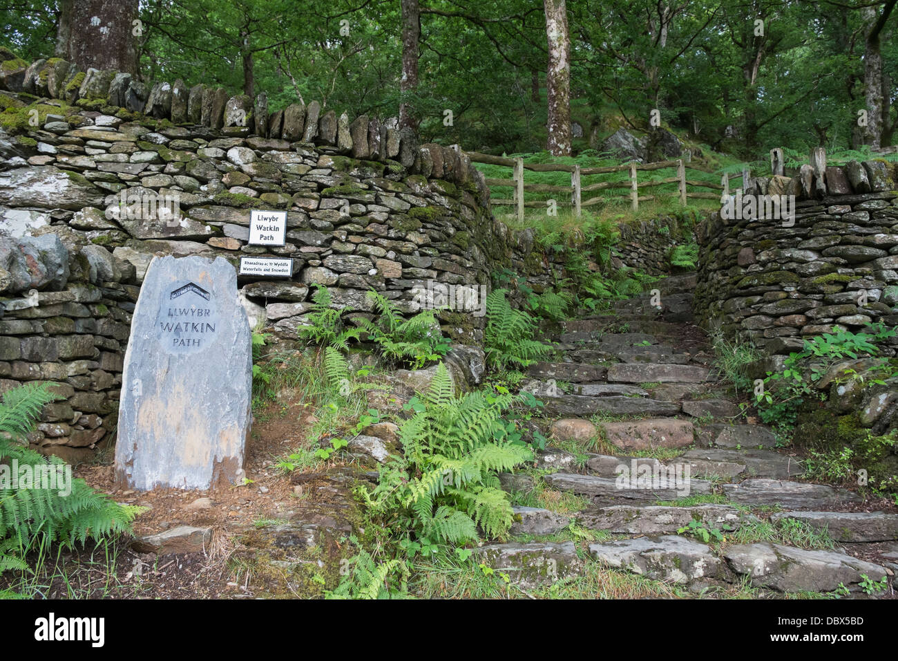 Slate sign by steps at start of Watkin path route through woodland to ...