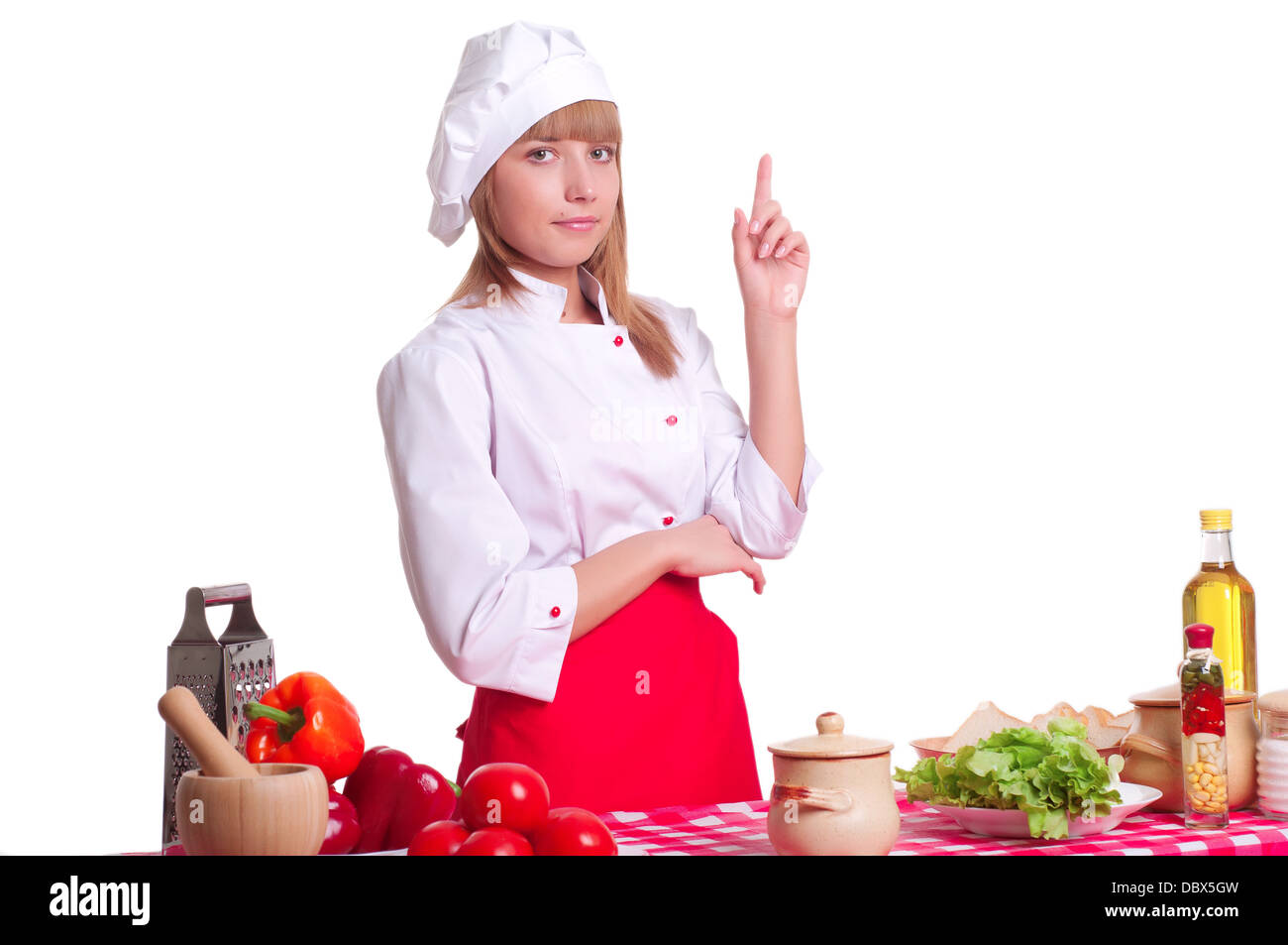 Attractive cook woman a over white background Stock Photo - Alamy