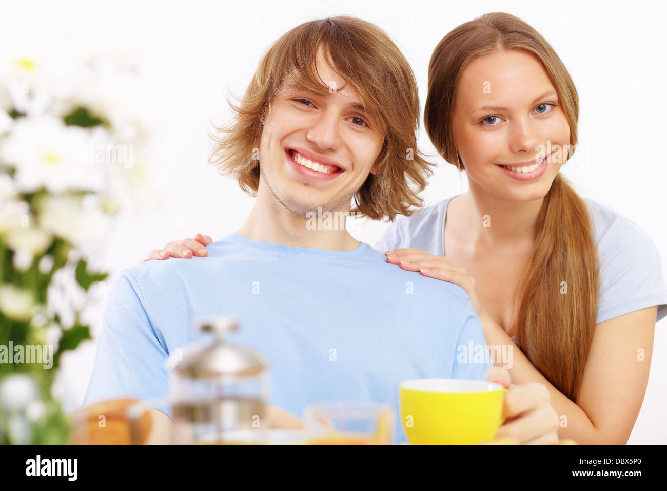 Couple at home drinking tea Stock Photo - Alamy
