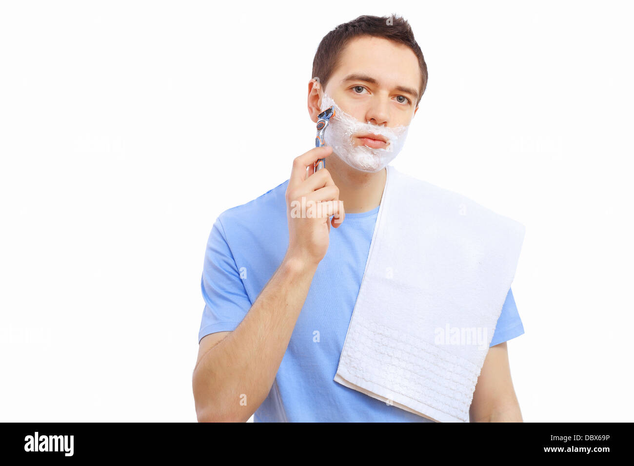 Young man shaving himself close hi-res stock photography and images - Alamy