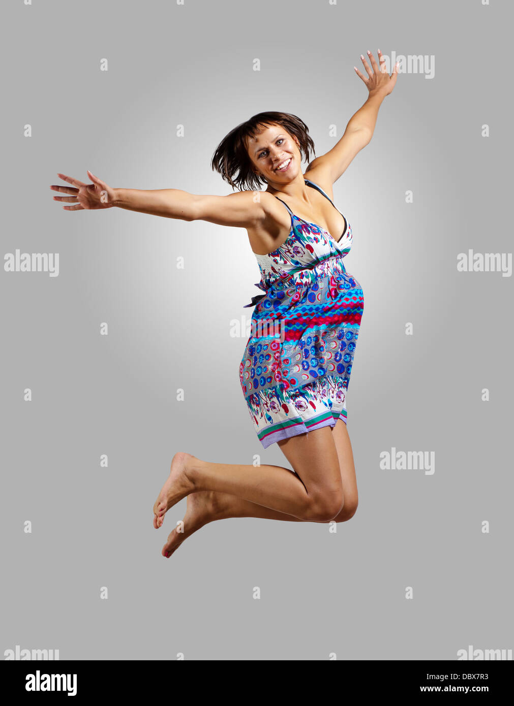 young woman dancing and jumping Stock Photo - Alamy