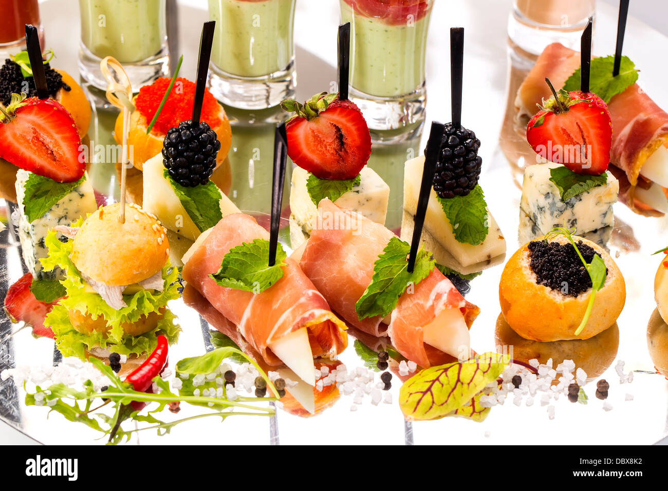 canape with meat vegetables and seafood Stock Photo - Alamy
