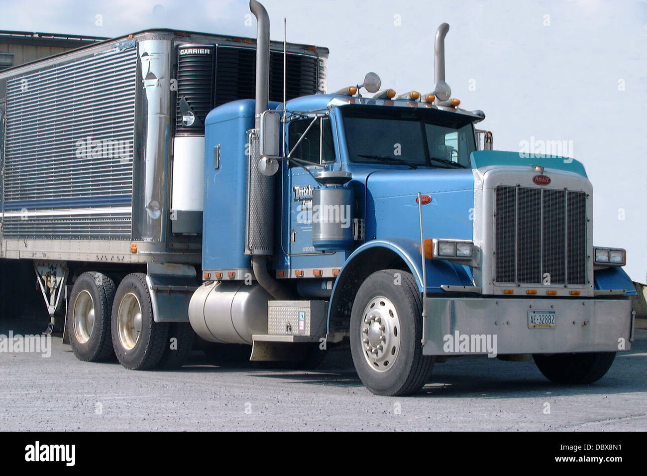 BLUE TRUCK PARKED IN DEPOT Stock Photo - Alamy