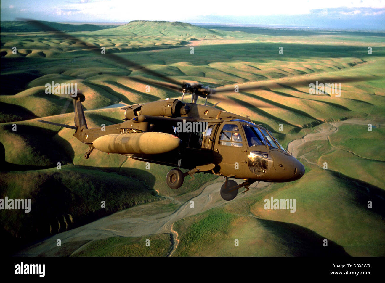 USAF BLACK HAWK HELICOPTER FLYING OVER HILLS Stock Photo - Alamy