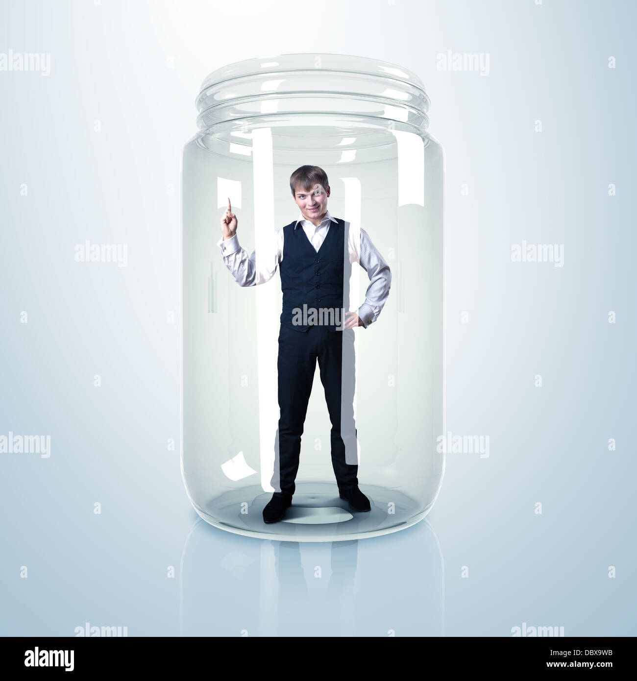 Businessman inside glass jar Stock Photo - Alamy