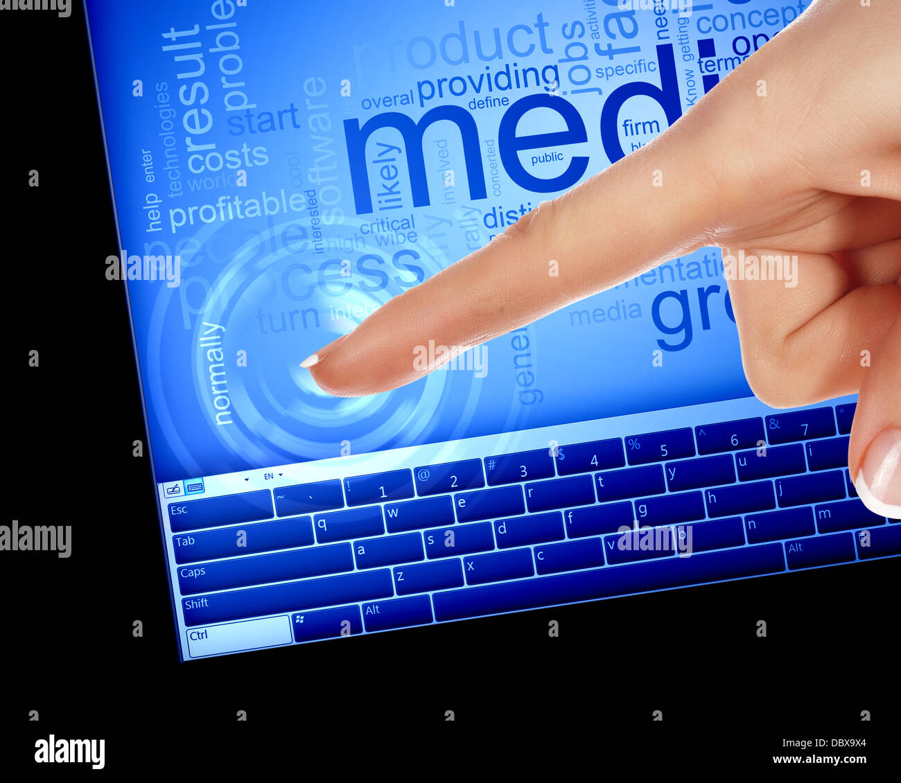Finger touching a blue computer screen Stock Photo - Alamy