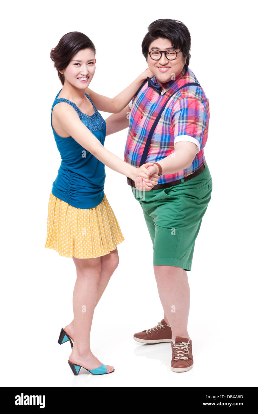 Overweight man dancing with girlfriend Stock Photo - Alamy