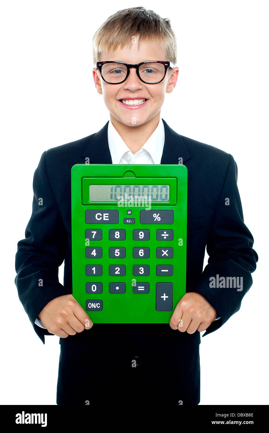Bright young kid holding large green calculator Stock Photo - Alamy