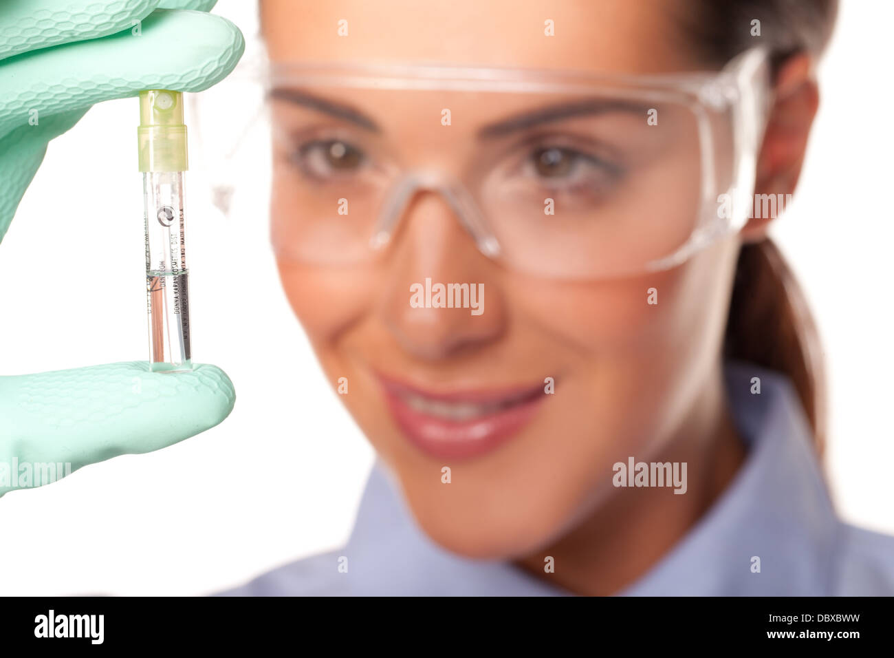 Laboratory technician, examining a test tube Stock Photo - Alamy