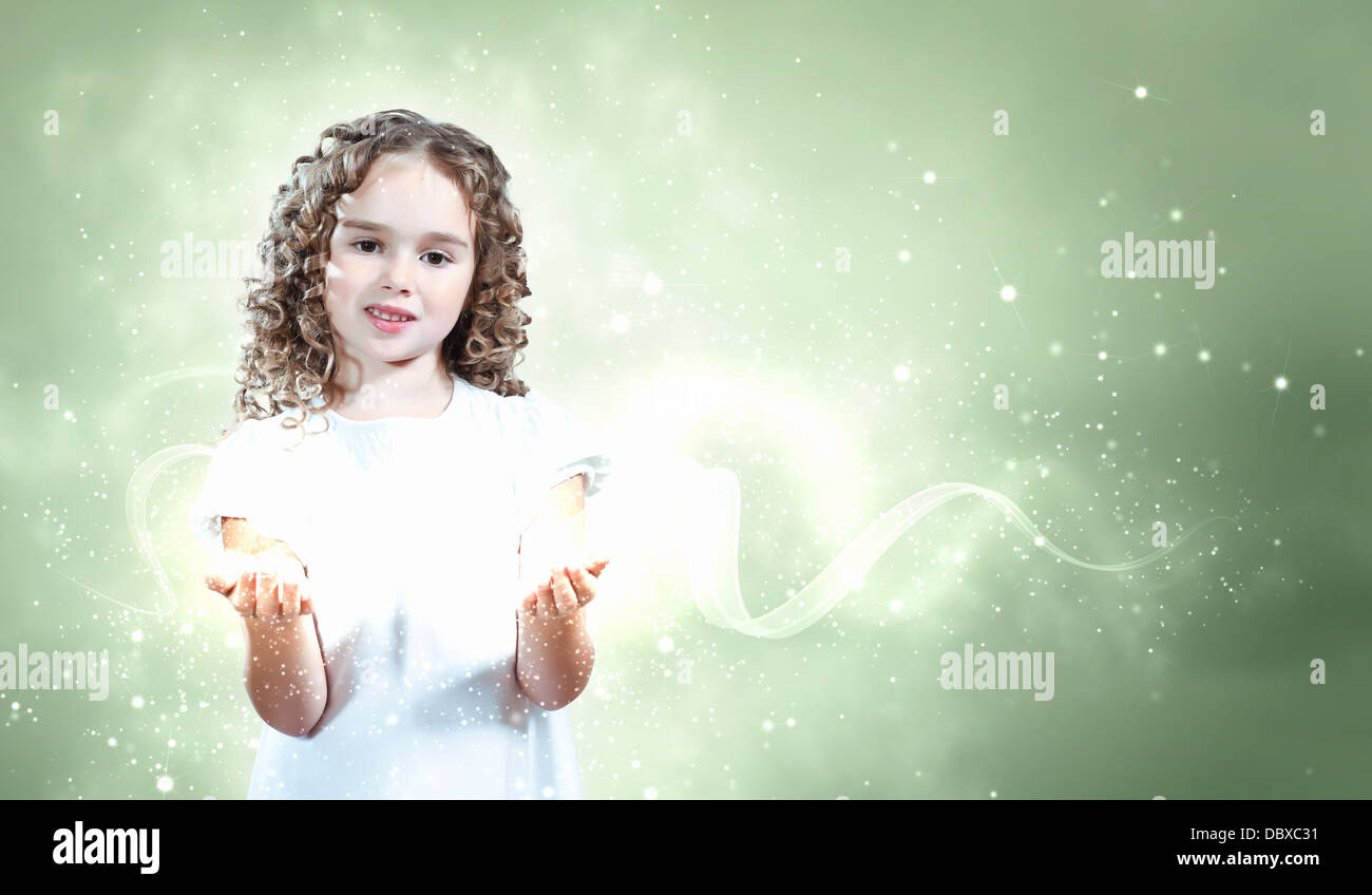 Child with magic light Stock Photo - Alamy