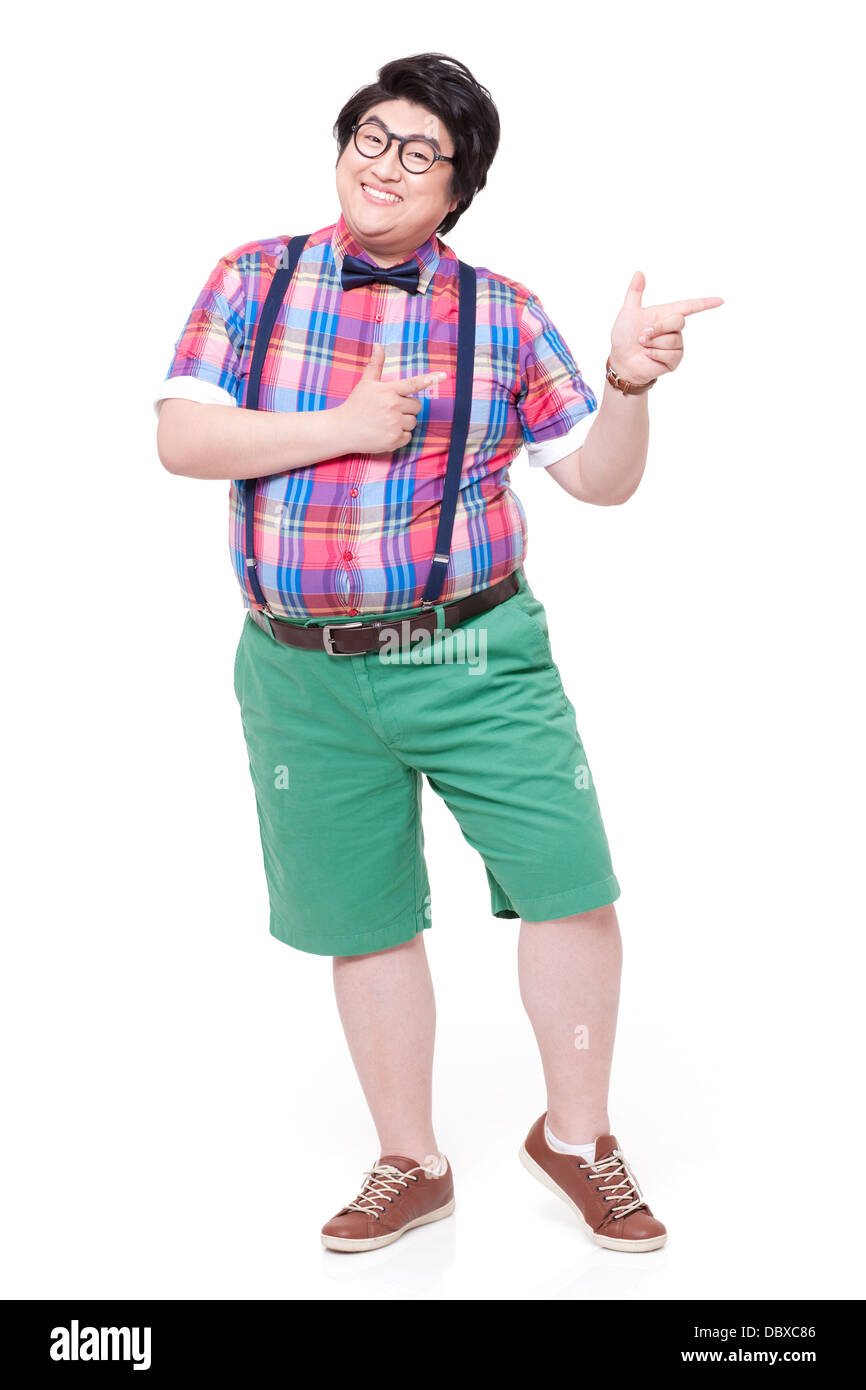 Casual young man pointing camera Cut Out Stock Images & Pictures - Alamy