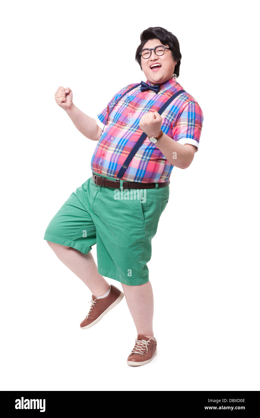 Fashionable fat man celebrating with excitement Stock Photo - Alamy