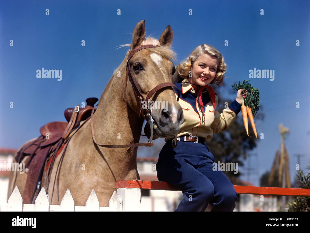 1940s 1950s SMILING YOUNG BLONDE COWGIRL SITTING ON FENCE POSING BY ...