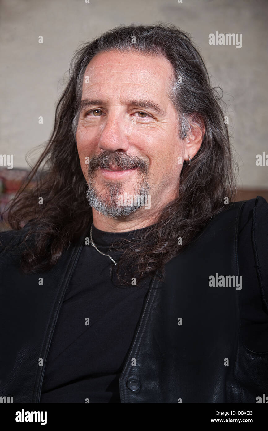 Smiling Male Biker Gang Member Stock Photo - Alamy