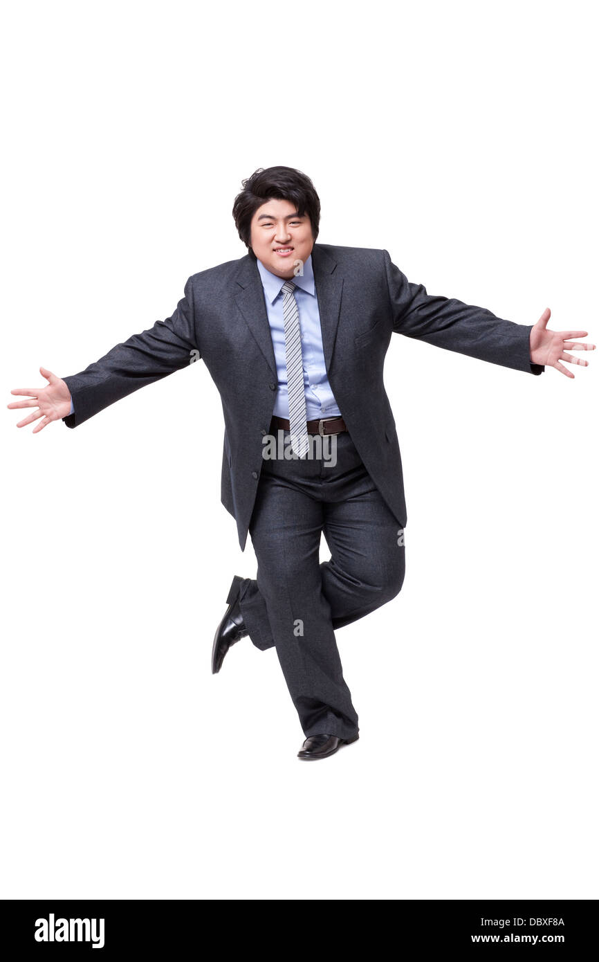 Happy overweight businessman dancing Stock Photo - Alamy