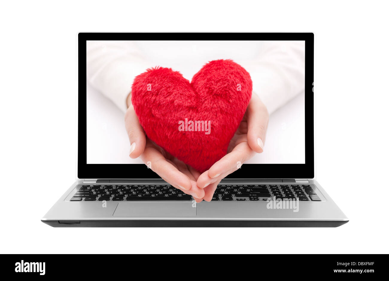 Laptop with red heart in woman hands. Clipping path included Stock ...