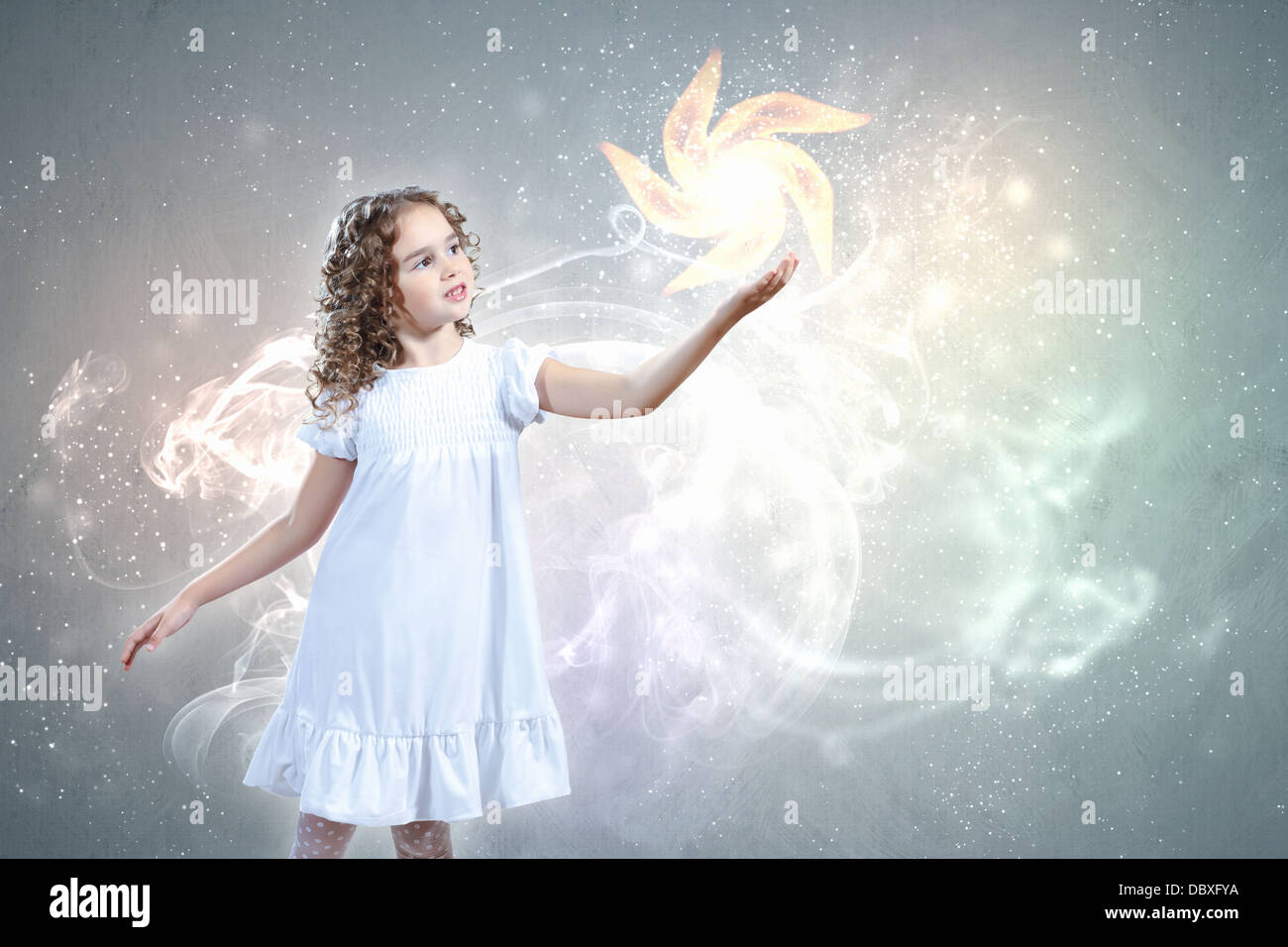 Child with magic light Stock Photo - Alamy