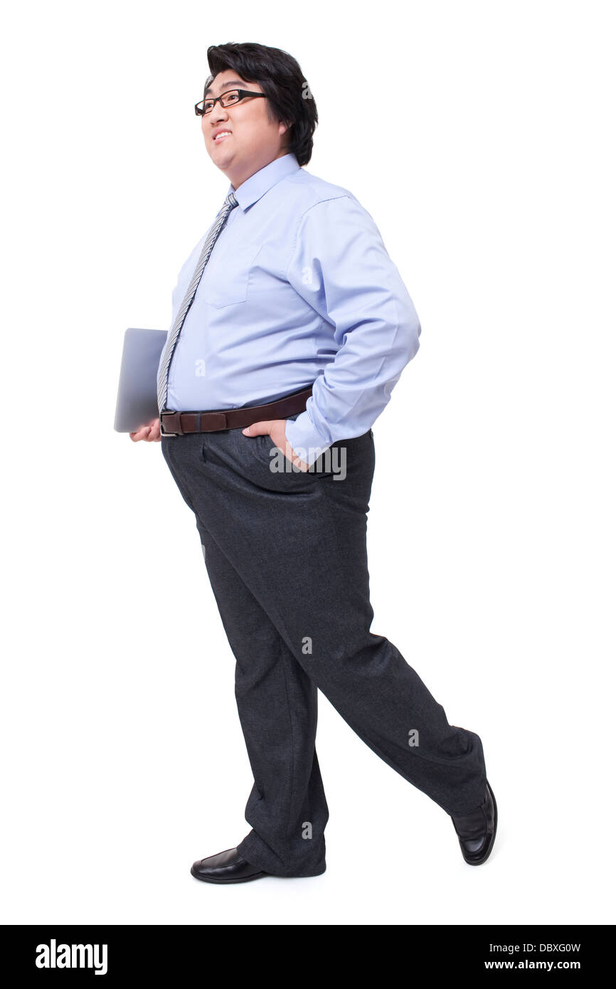 Overweight businessman on the move Stock Photo - Alamy