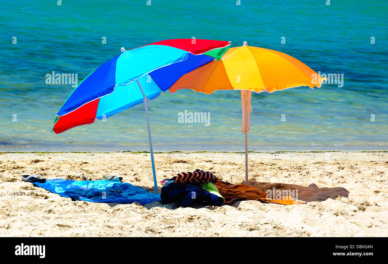 Bright yellow parasols hi-res stock photography and images - Alamy