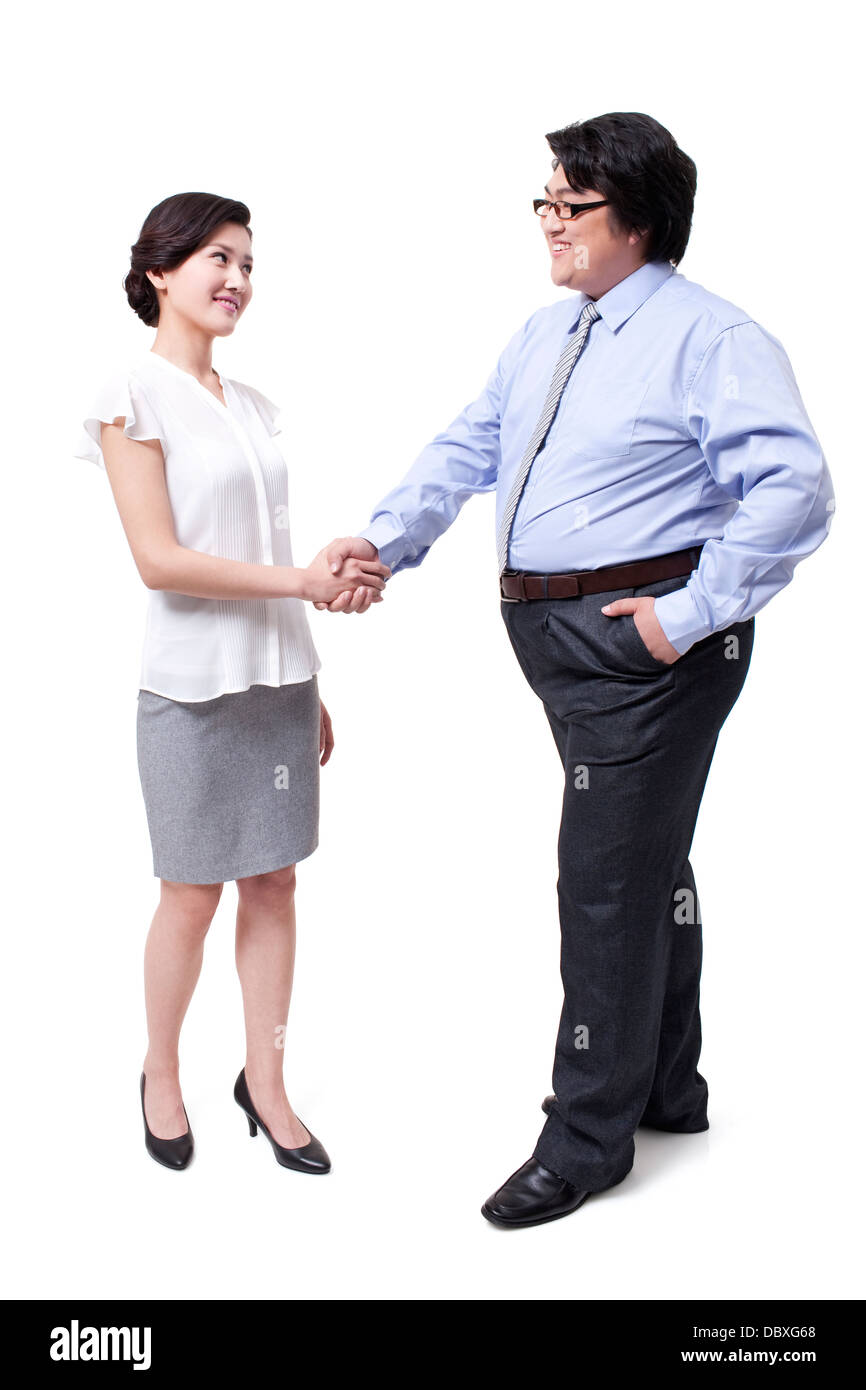 Happy business partner shaking hands Stock Photo - Alamy
