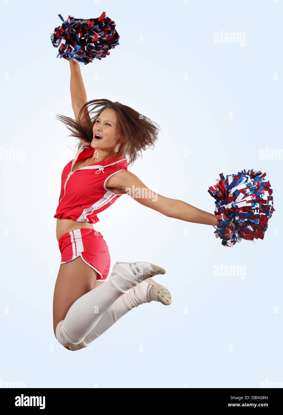 cheerleader girl jumping Stock Photo - Alamy