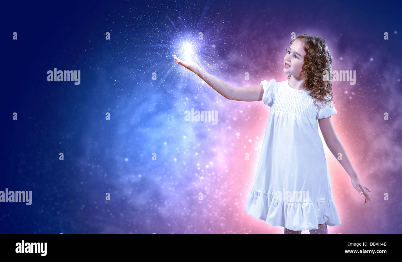 Child with magic light Stock Photo - Alamy