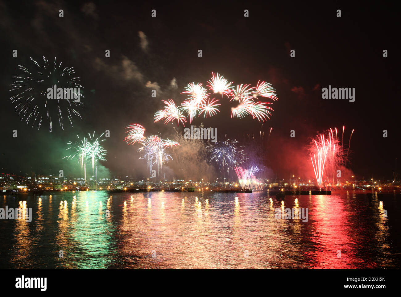 beauty of the fireworks reflect on sea water Stock Photo - Alamy
