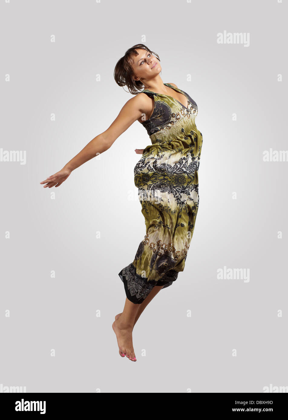 young woman dancing and jumping Stock Photo - Alamy