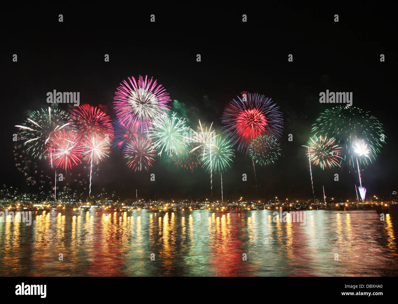 beauty of the fireworks reflect on sea water Stock Photo - Alamy