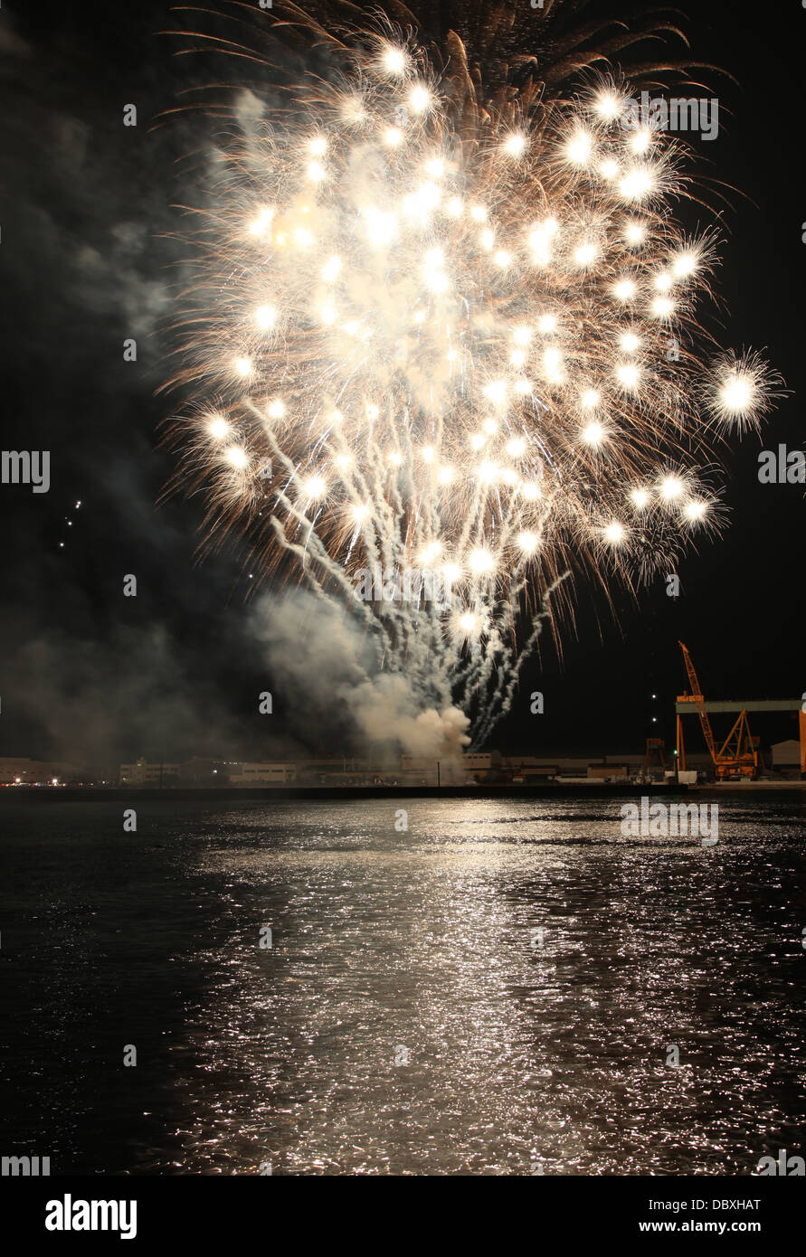 beauty of the fireworks reflect on sea water Stock Photo - Alamy