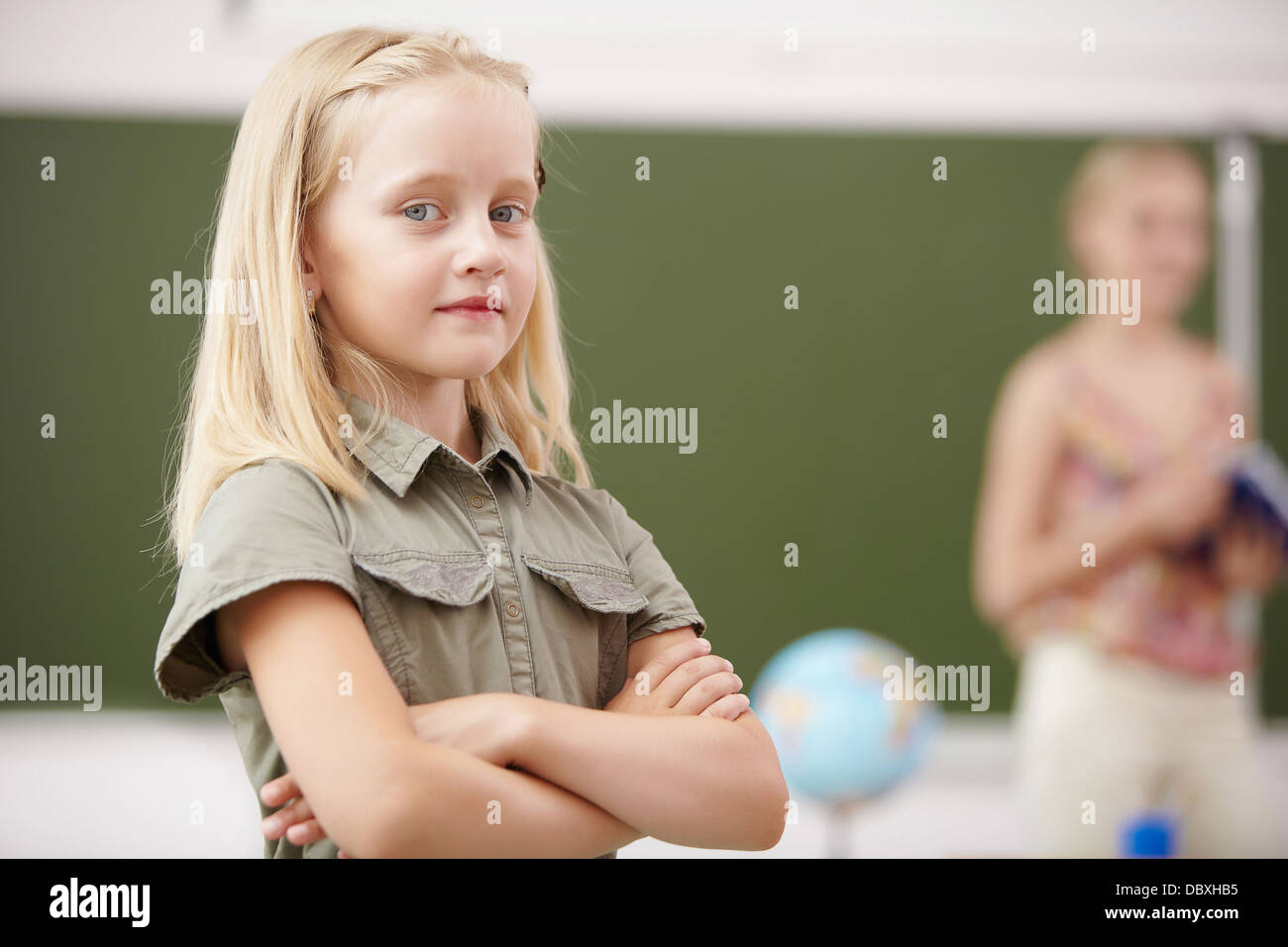Little girl at school class Stock Photo - Alamy