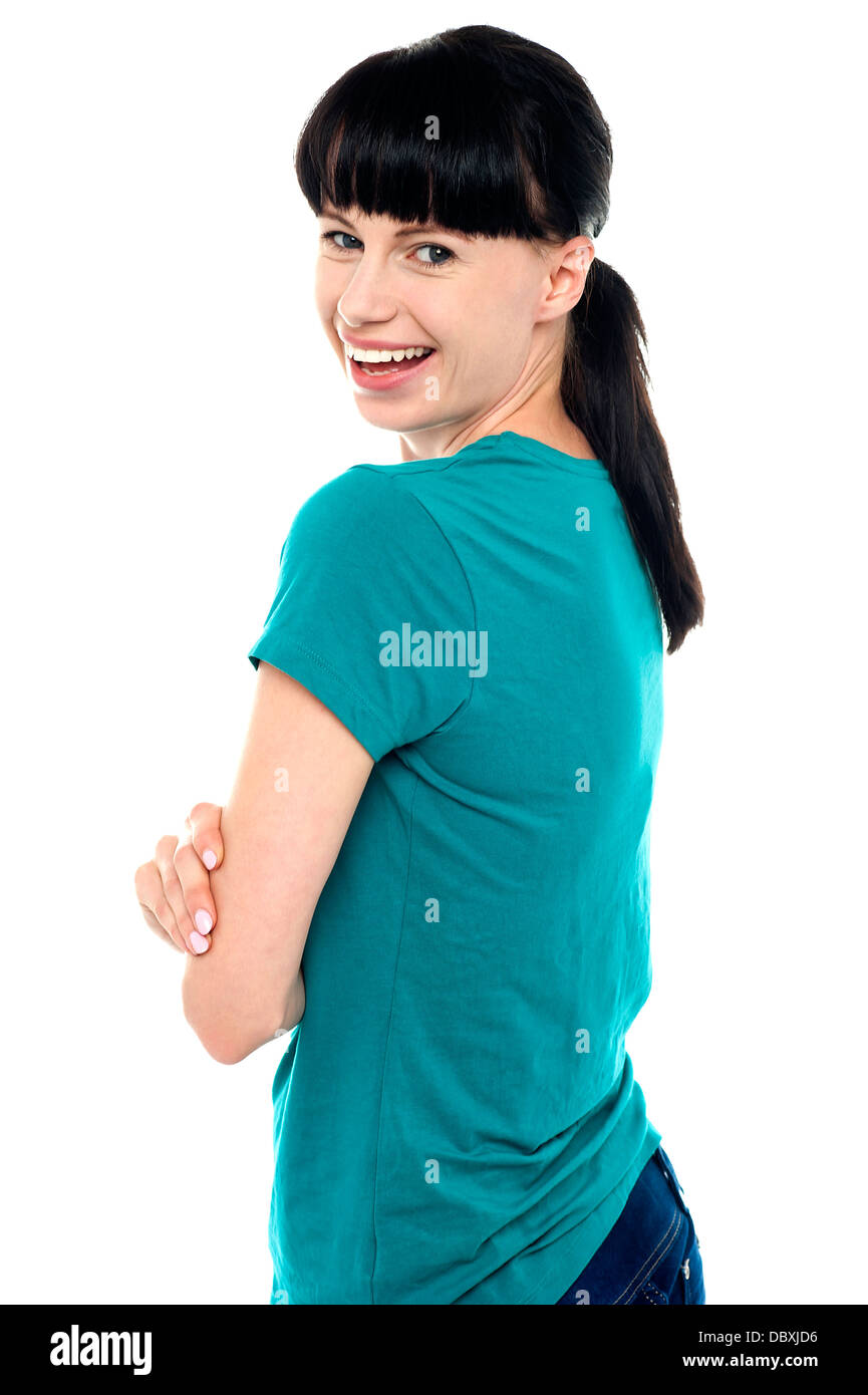 Gorgeous charming female turning and looking at camera Stock Photo - Alamy