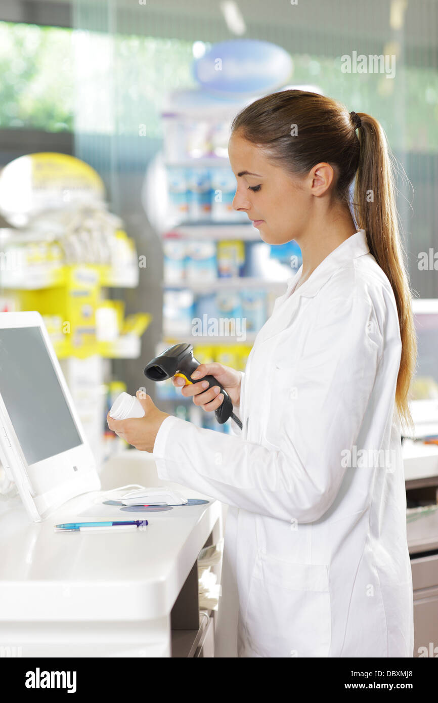 Pharmacy: Scanning a Pill Bottle Stock Photo - Alamy