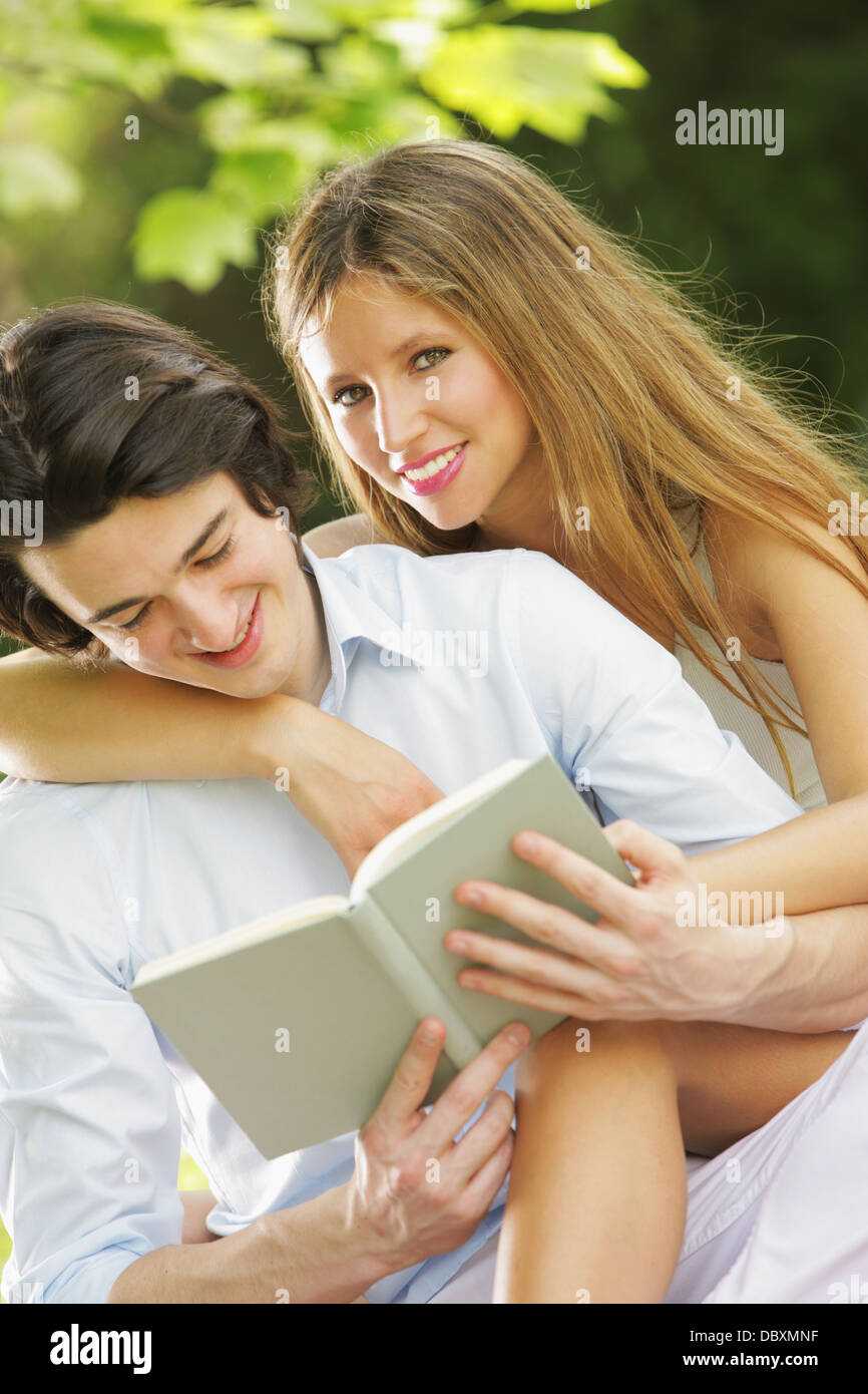 Woman read couple pair hi-res stock photography and images - Alamy