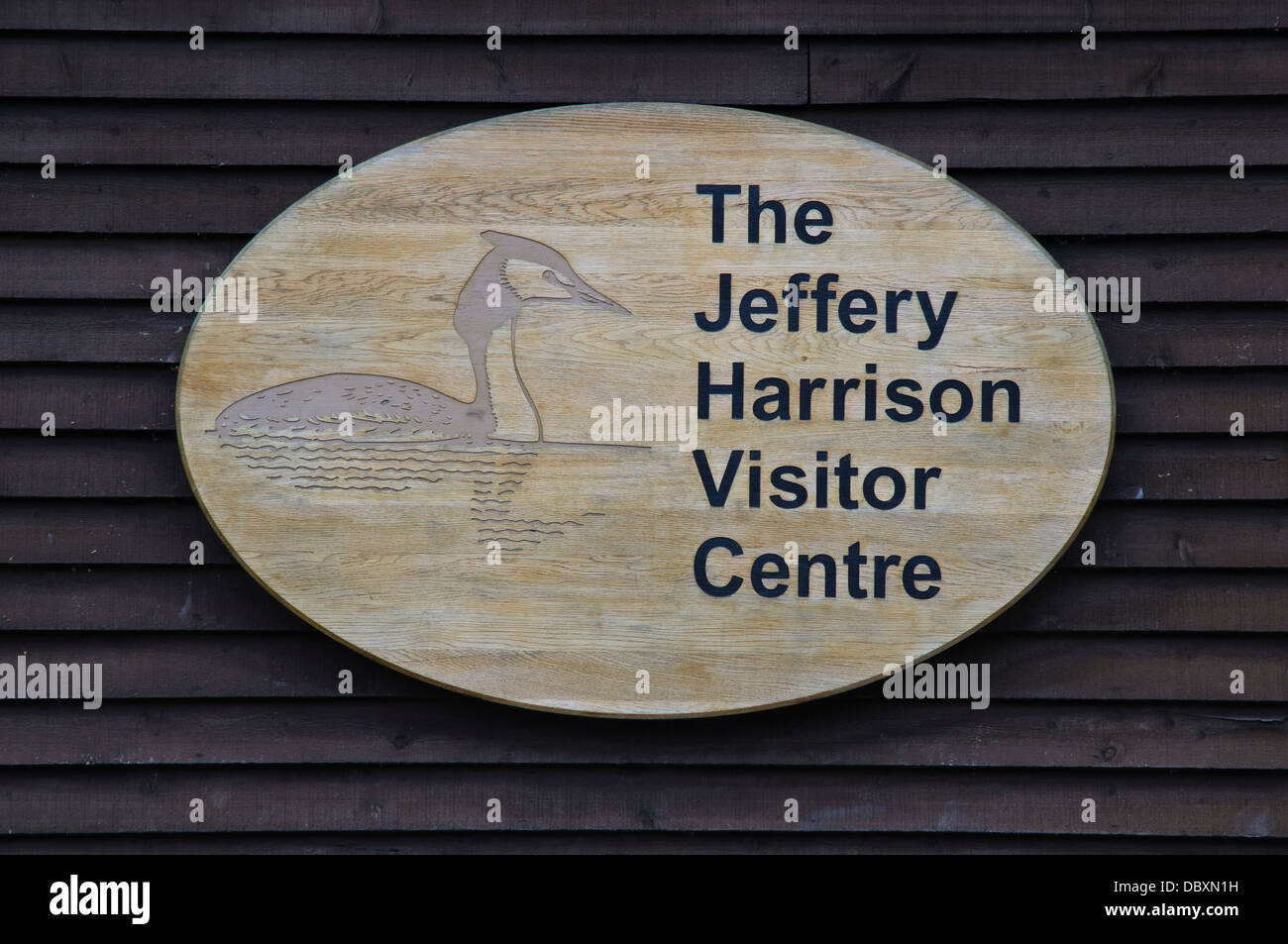 Name plate for the Jeffrey Harrison Visitor Centre, featuring a relief ...