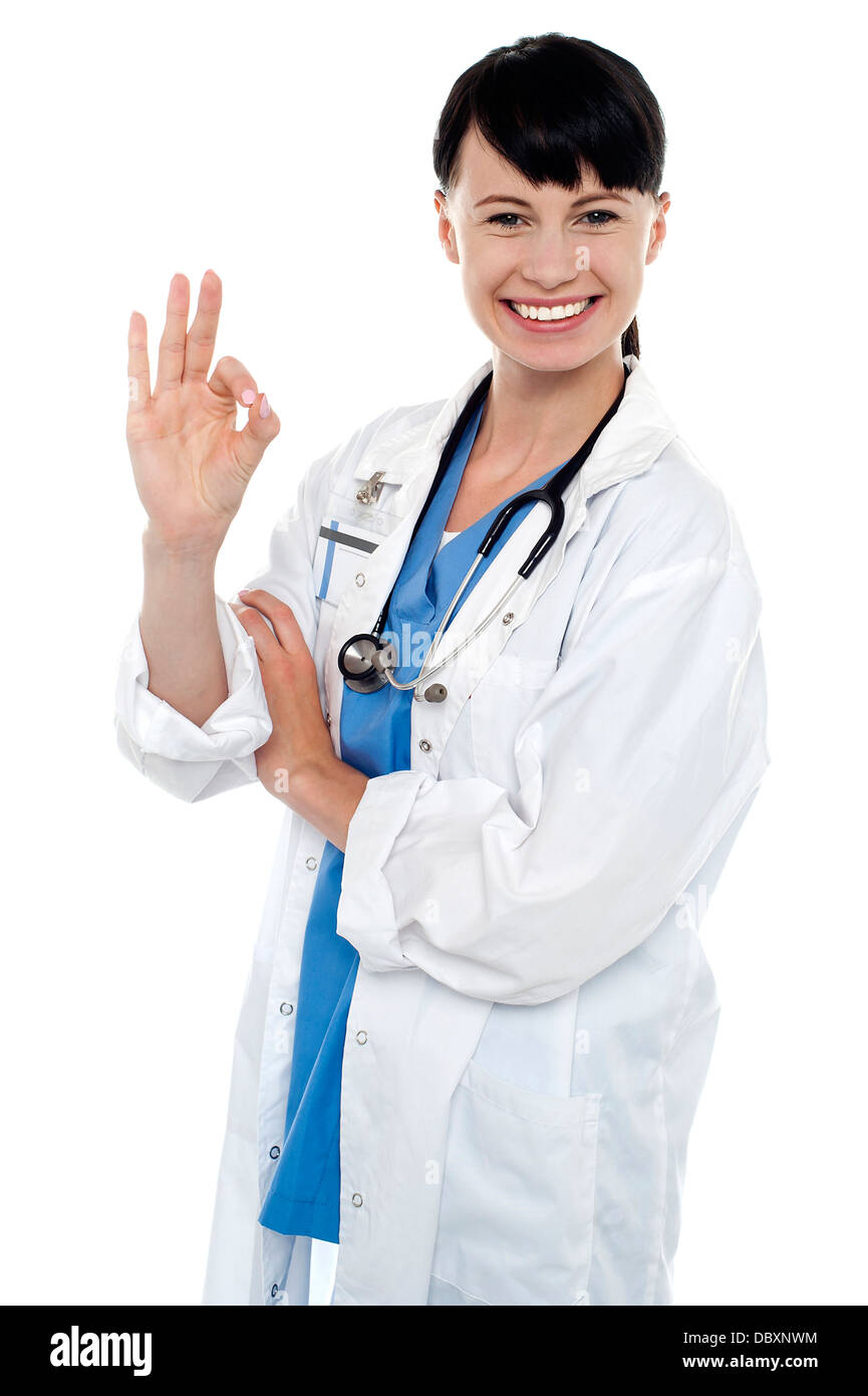 Smiling medical practitioner showing perfect sign Stock Photo - Alamy
