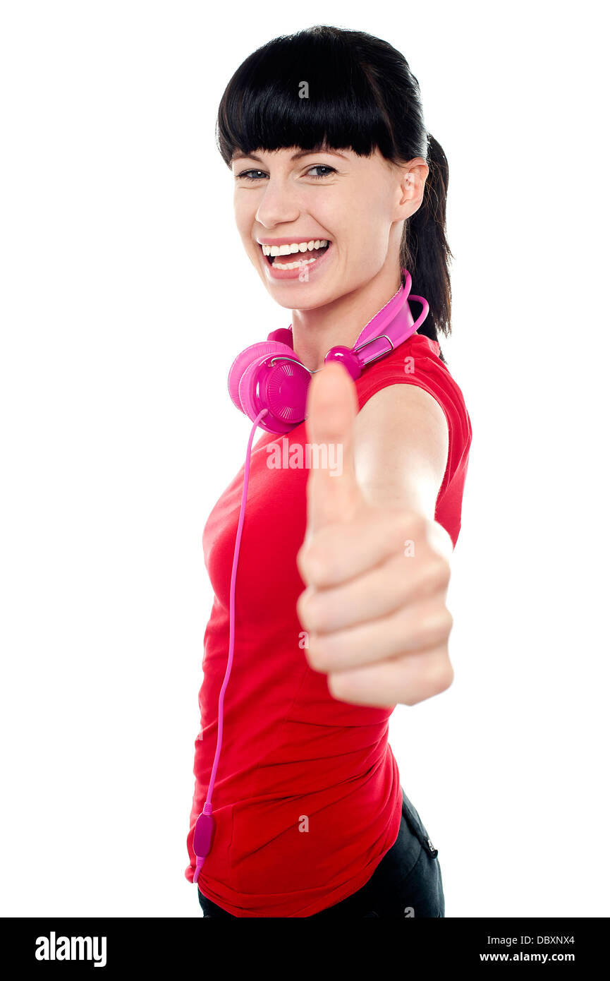 Carefree teenager flashing thumbs up sign Stock Photo - Alamy