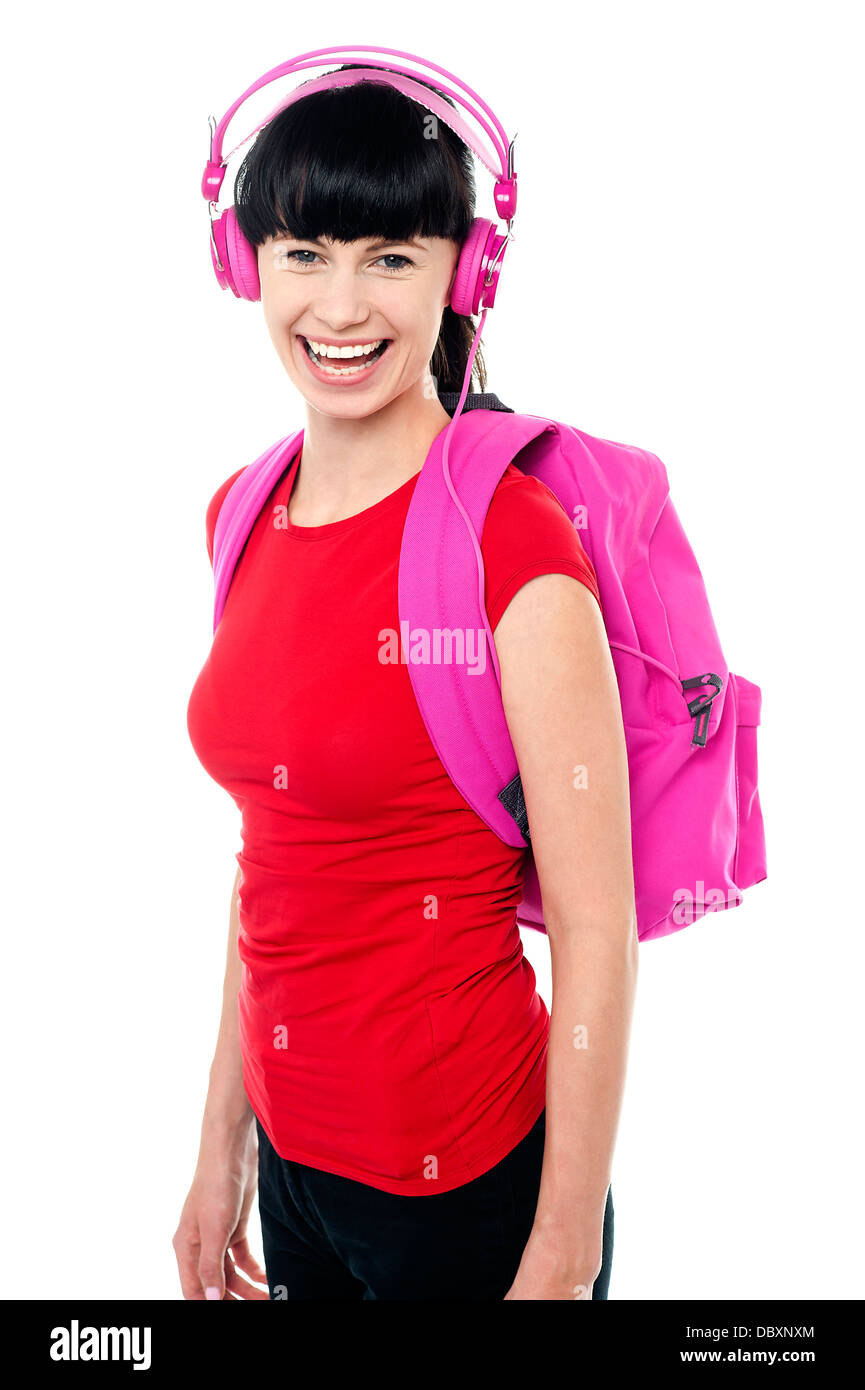 Student enjoying music on her way to college Stock Photo - Alamy