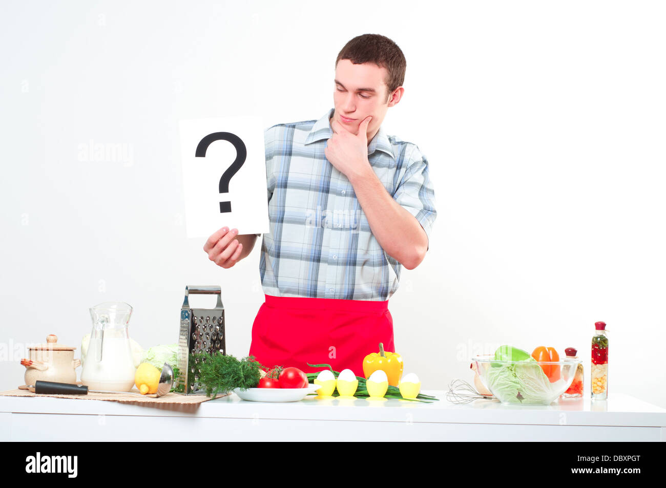 portrait of a young man, hold question mark Stock Photo - Alamy