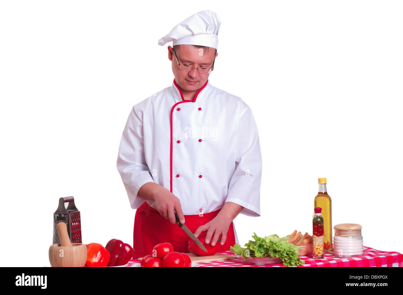 Handsome man cooking in the kitchen at home Stock Photo - Alamy