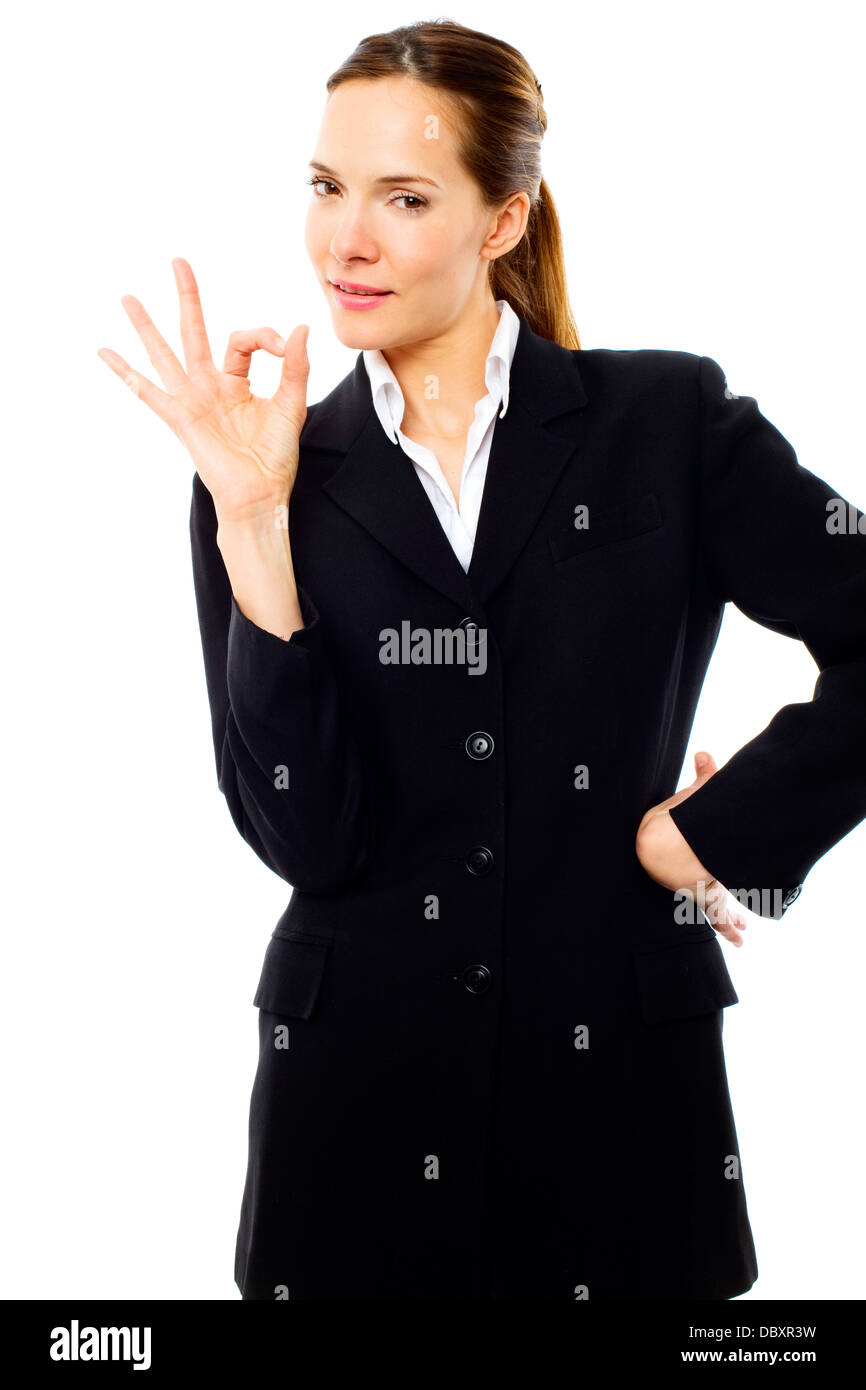 young businesswoman with her hand indicating ok on white backgro Stock Photo - Alamy