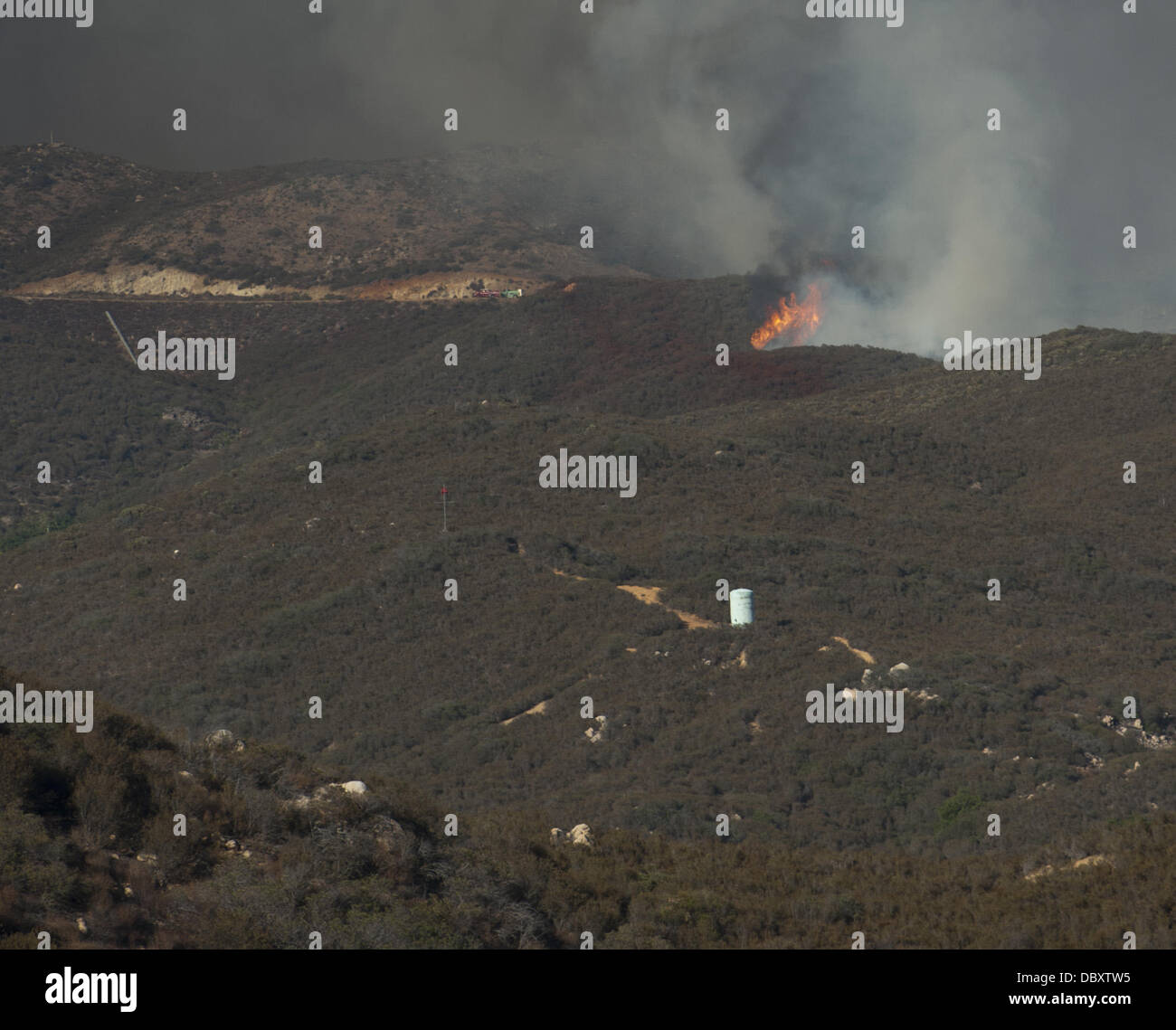 El Cariso, California, USA. 5th Aug, 2013. Flames rise up along a fire ...