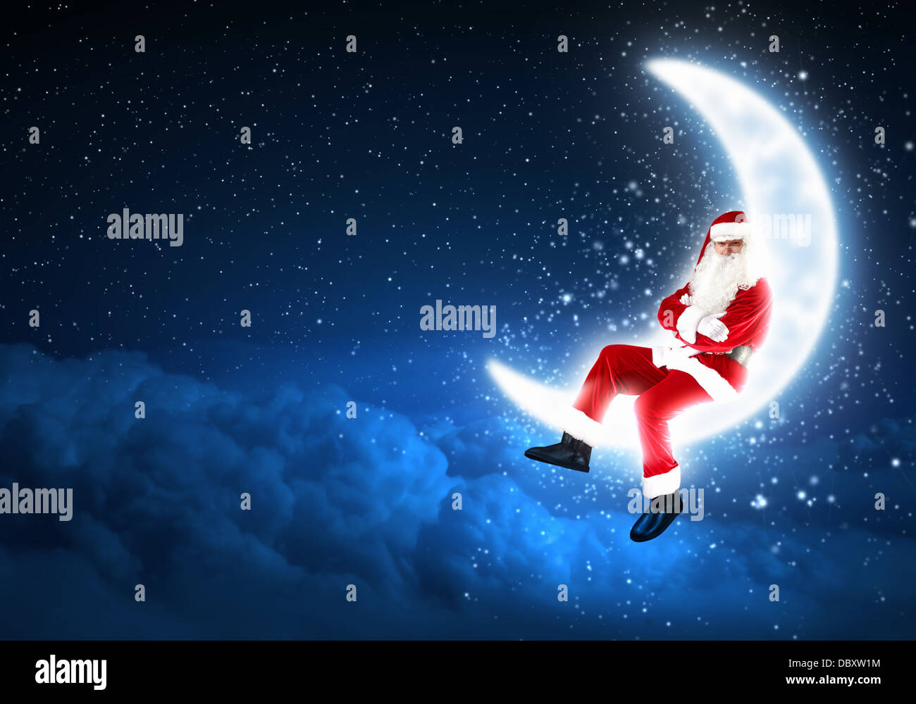 photo of santa claus sitting on the moon Stock Photo - Alamy