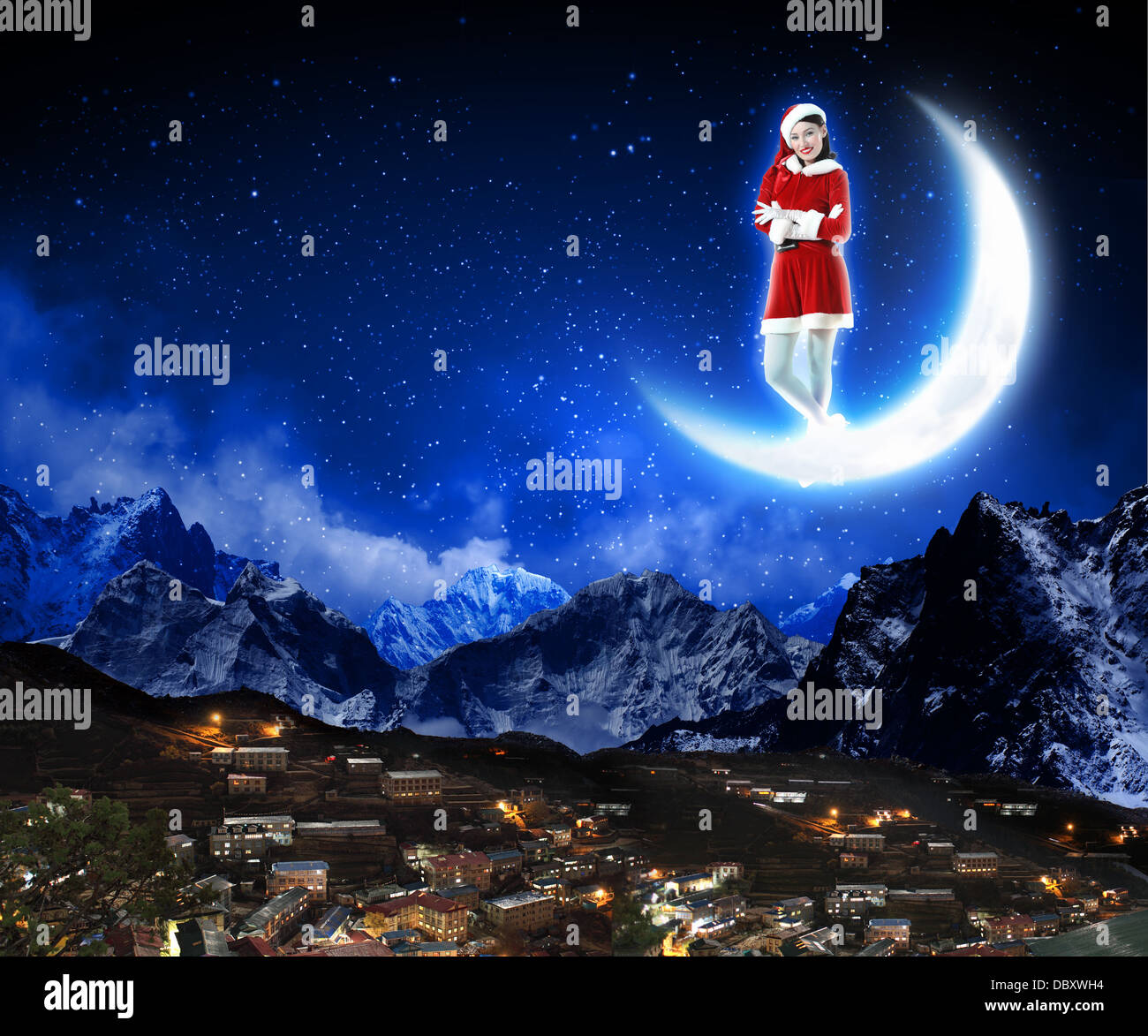 photo of santa claus sitting on the moon Stock Photo - Alamy