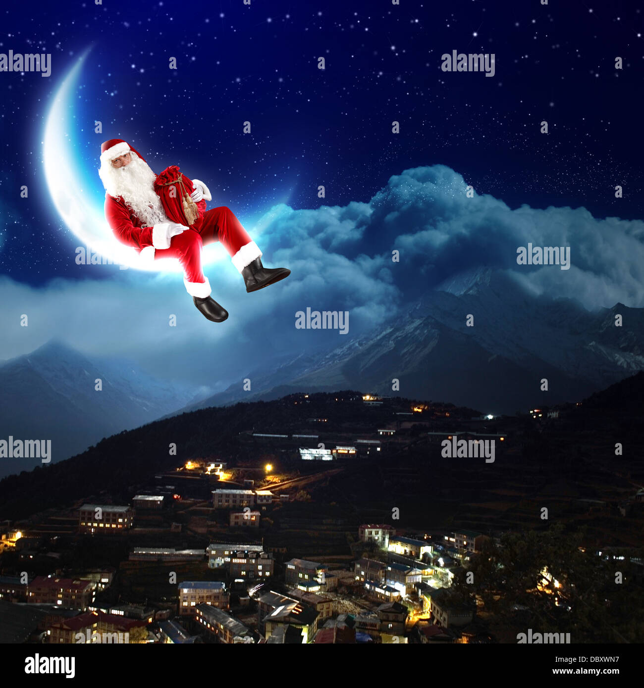 photo of santa claus sitting on the moon Stock Photo - Alamy