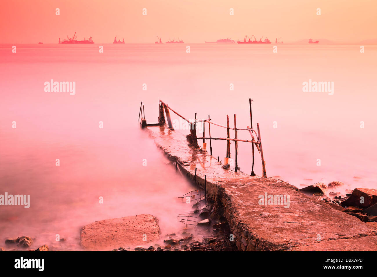 jetty at sunset Stock Photo - Alamy