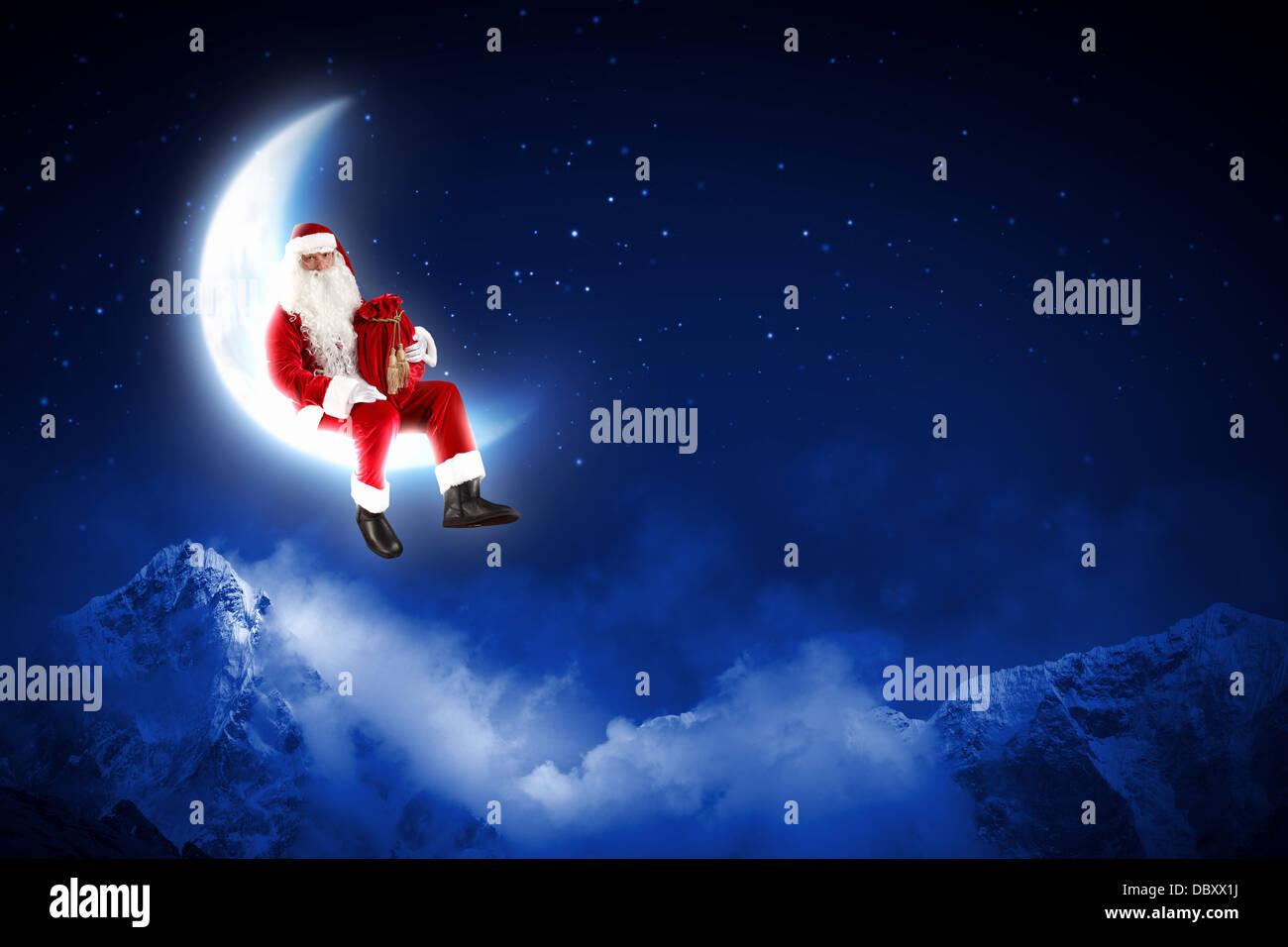 photo of santa claus sitting on the moon Stock Photo - Alamy